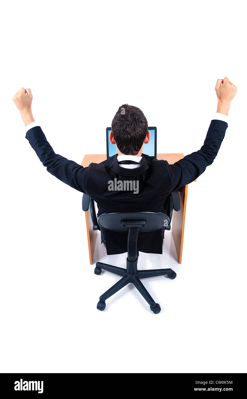 Happy man sitting at desk isolated Cut Out Stock Images & Pictures - Alamy