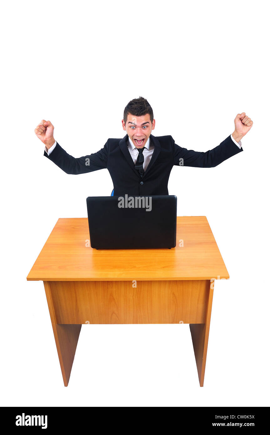 Happy man sitting at desk isolated Cut Out Stock Images & Pictures - Alamy