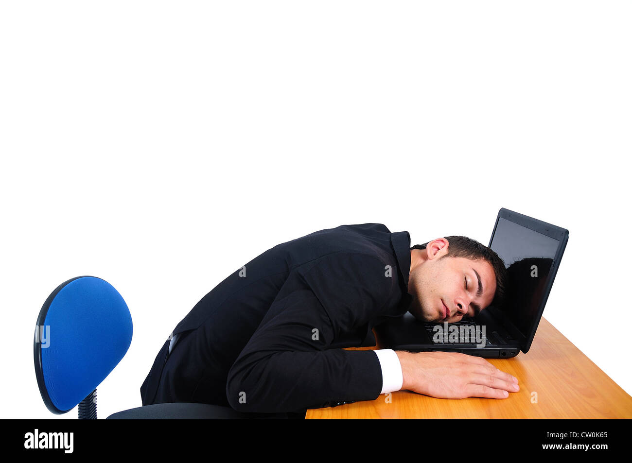 Isolated young business man sleeping Stock Photo - Alamy