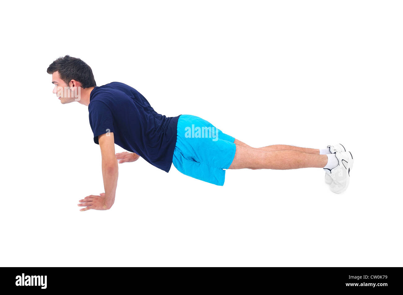 Isolated man in sport wear push-ups Stock Photo - Alamy