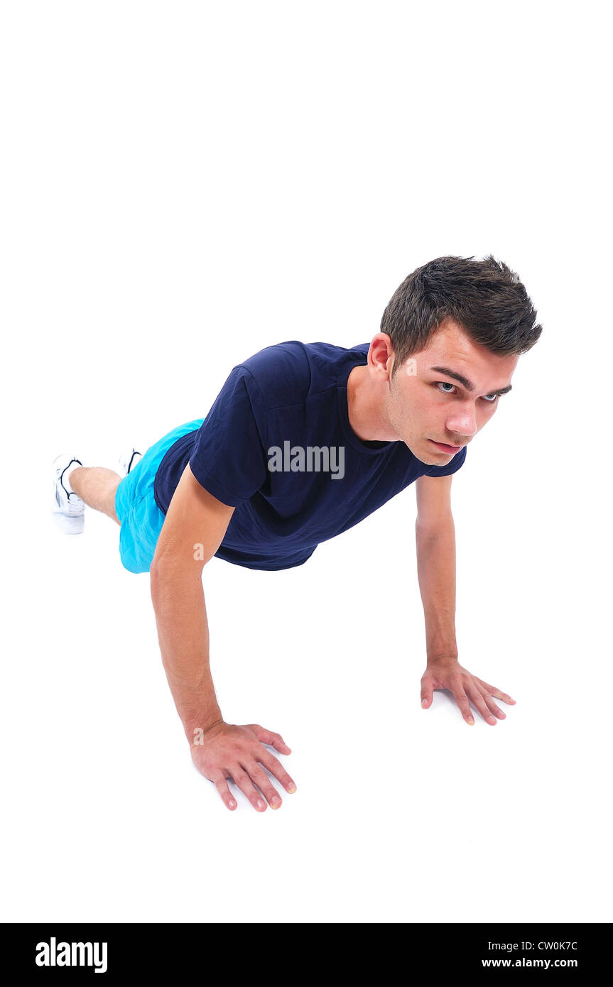 Isolated man in sport wear push-ups Stock Photo - Alamy