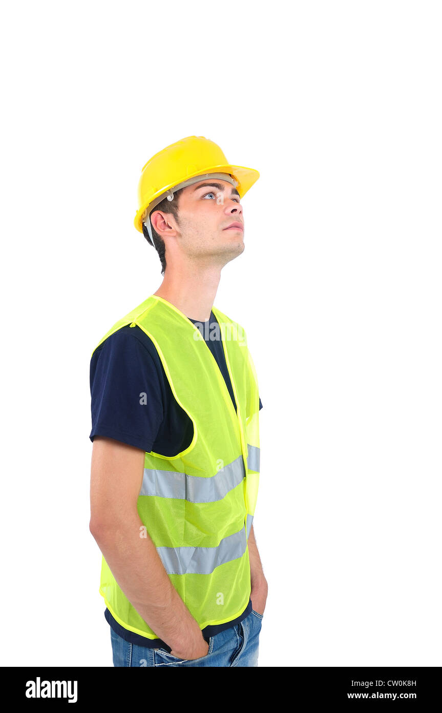 Isolated worker with helmet standing Stock Photo - Alamy