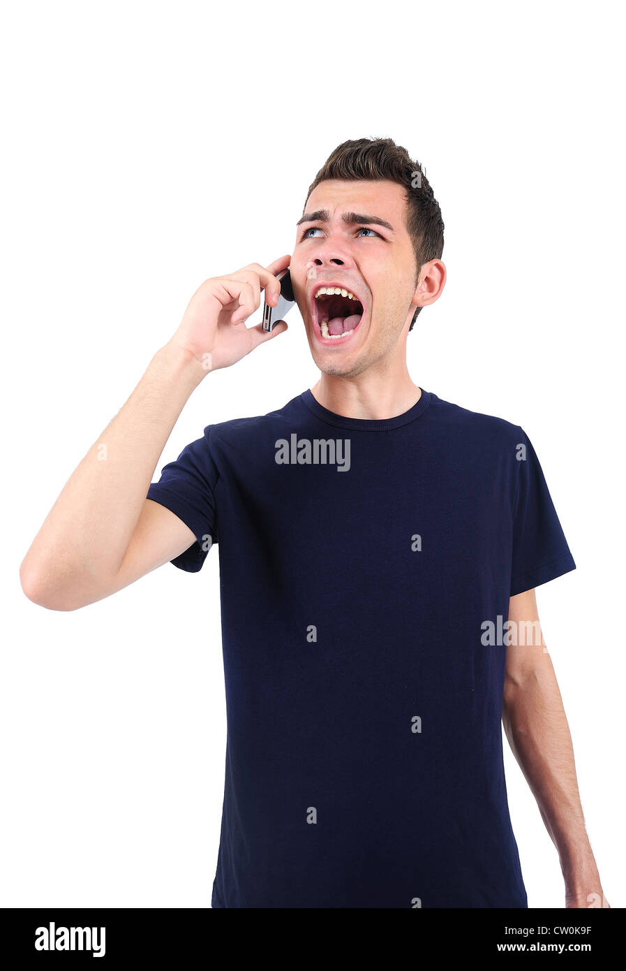 Isolated casual man screaming at phone Stock Photo - Alamy