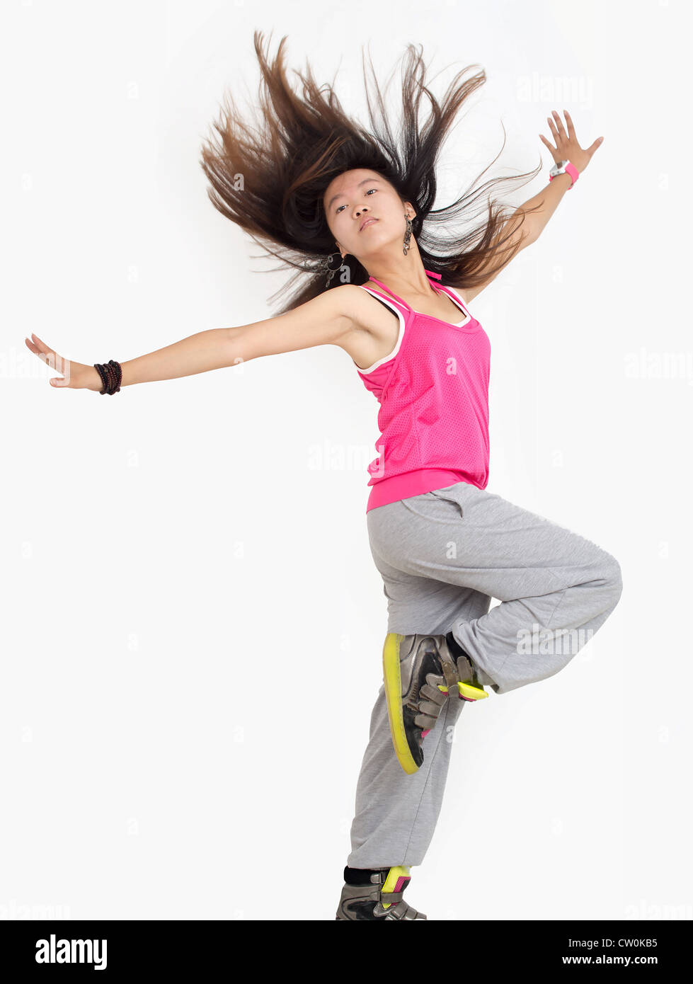 Teenage girl dancing hip-hop studio series Stock Photo - Alamy