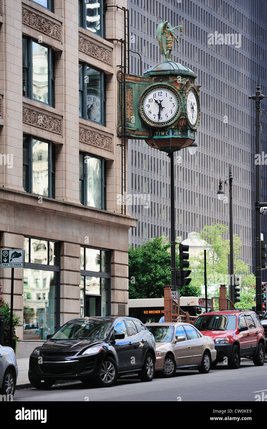 Chicago downtown street view with old fashion clock and skyscraper ...