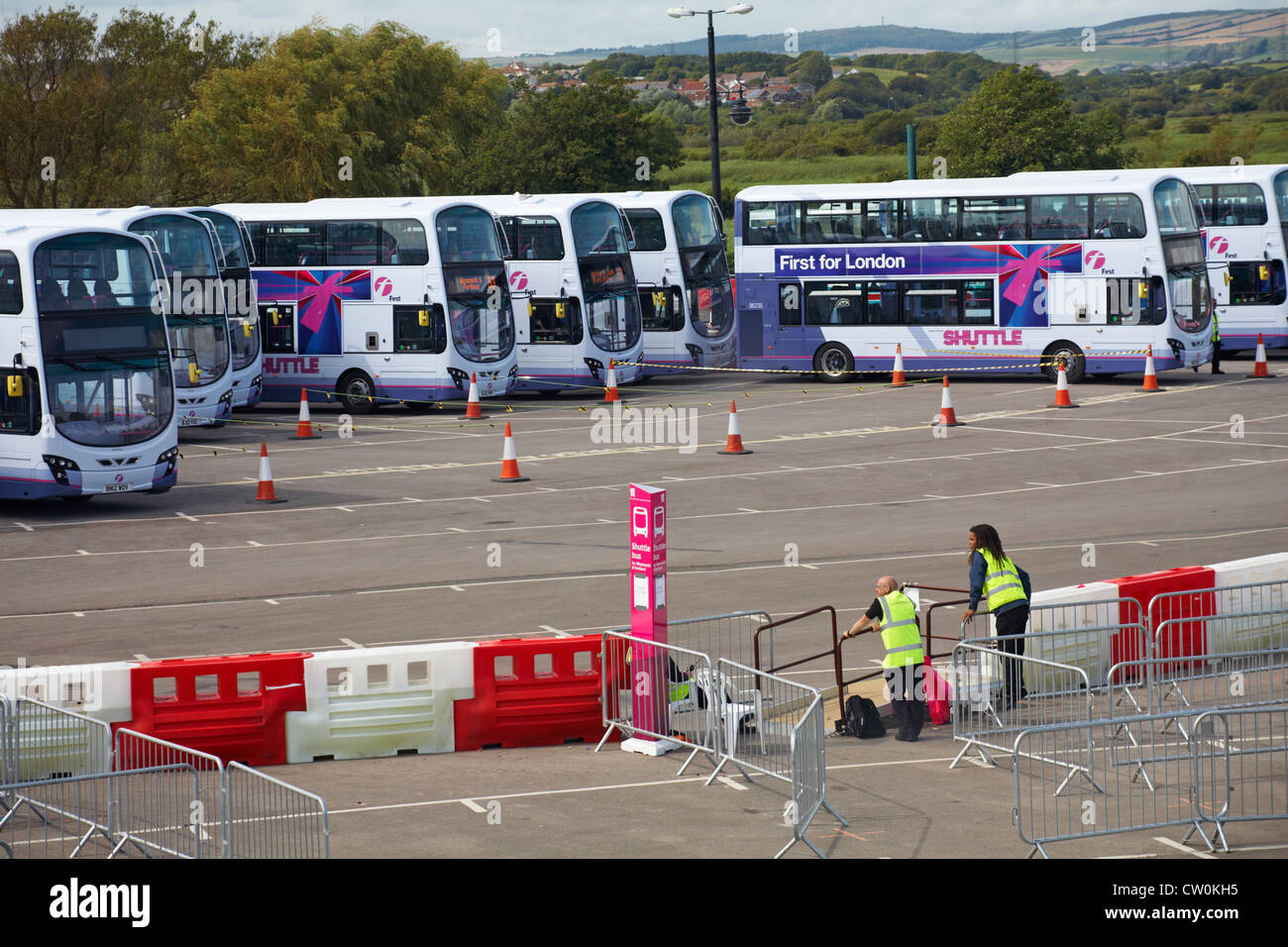 Shuttle buses waiting at car park in Weymouth to transport passengers ...
