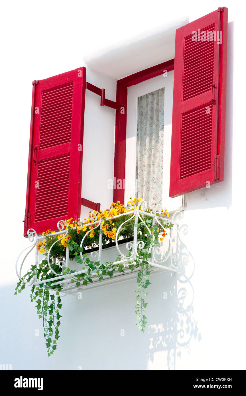 red vintage windows in Greek Style Stock Photo - Alamy