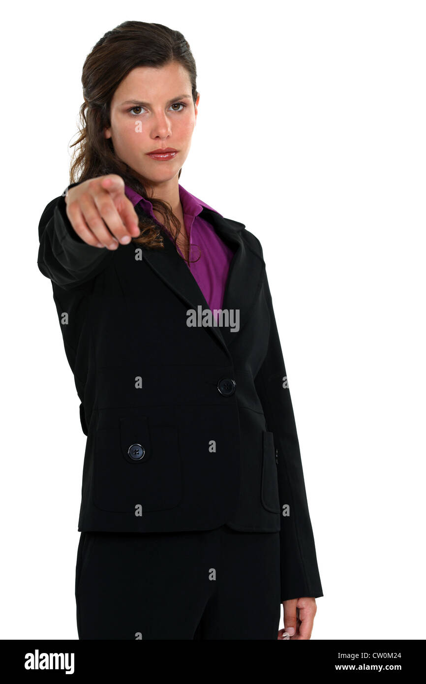young businesswoman pointing at someone in front of her Stock Photo - Alamy