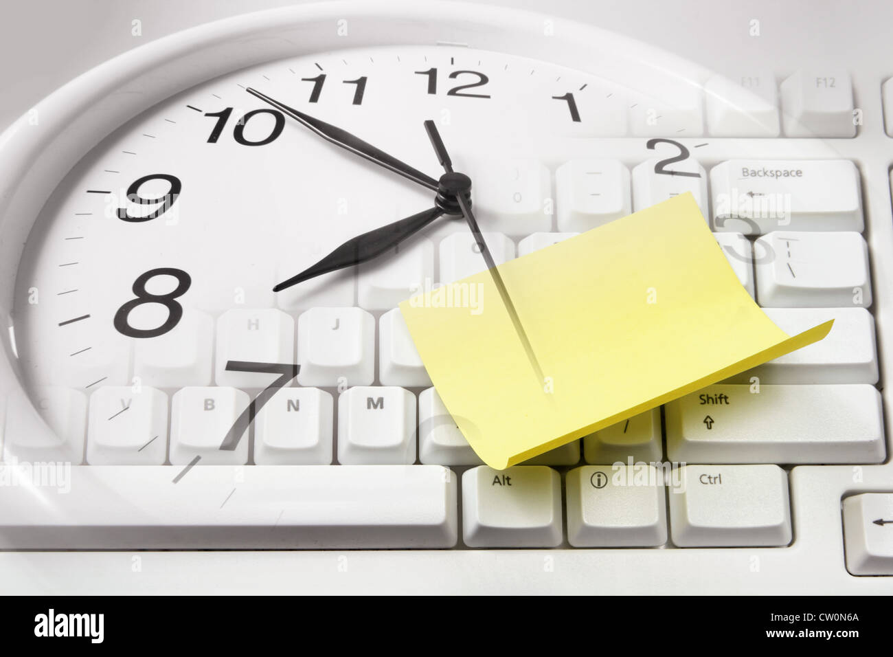 Clock and Computer Keyboard Stock Photo - Alamy