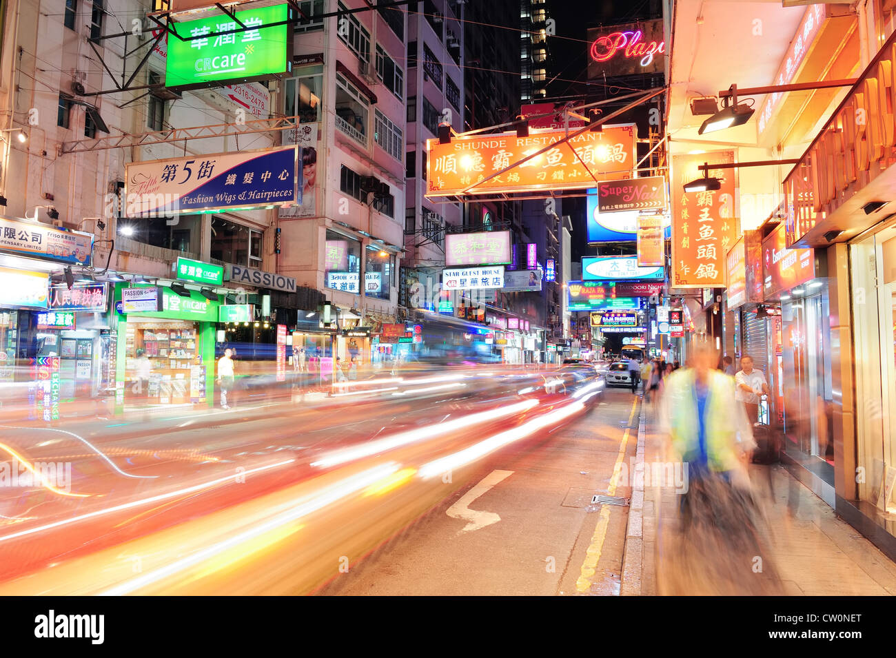 Crowded street view at night Stock Photo - Alamy