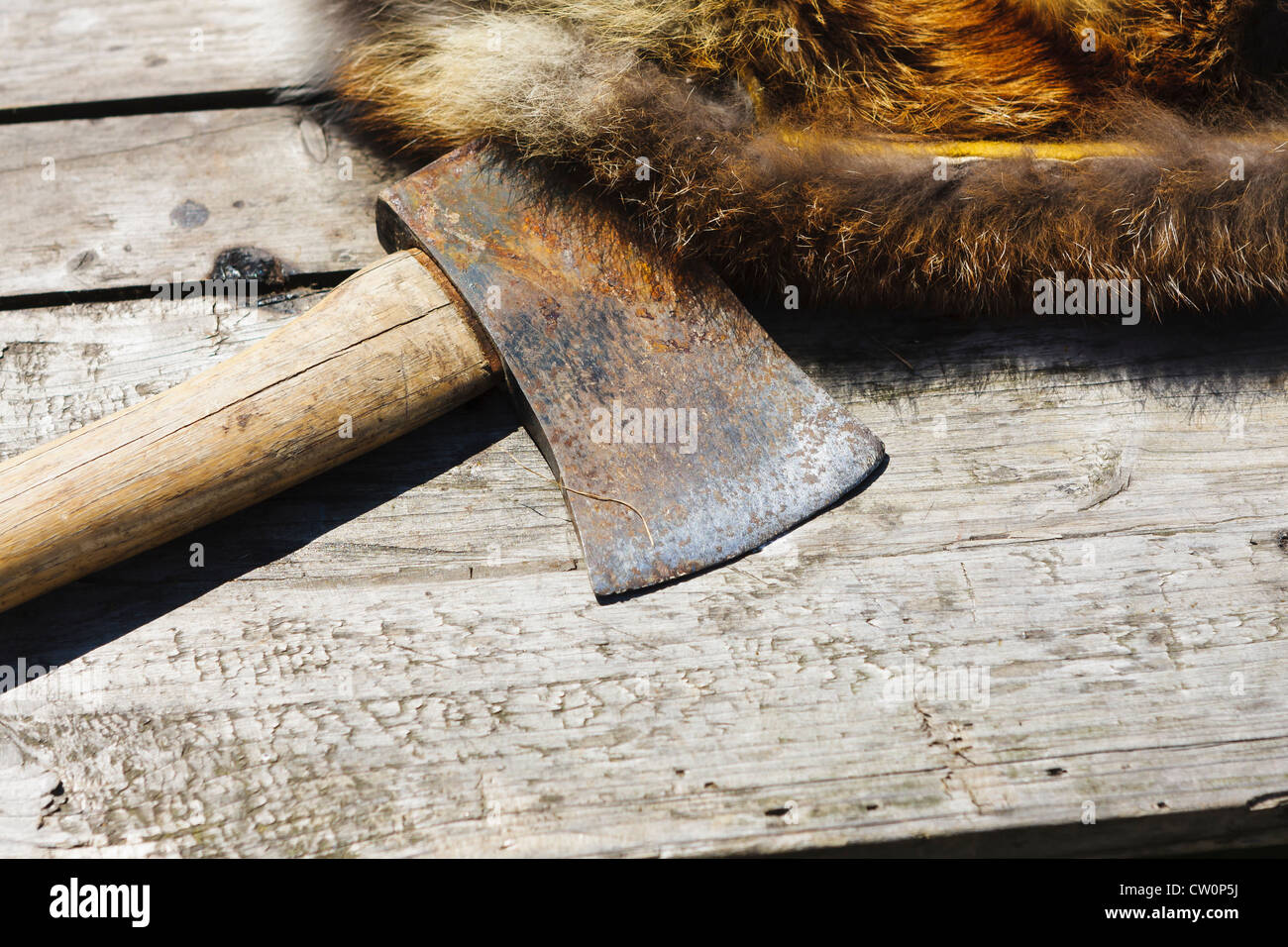 Replica early medieval axe and fur Stock Photo - Alamy