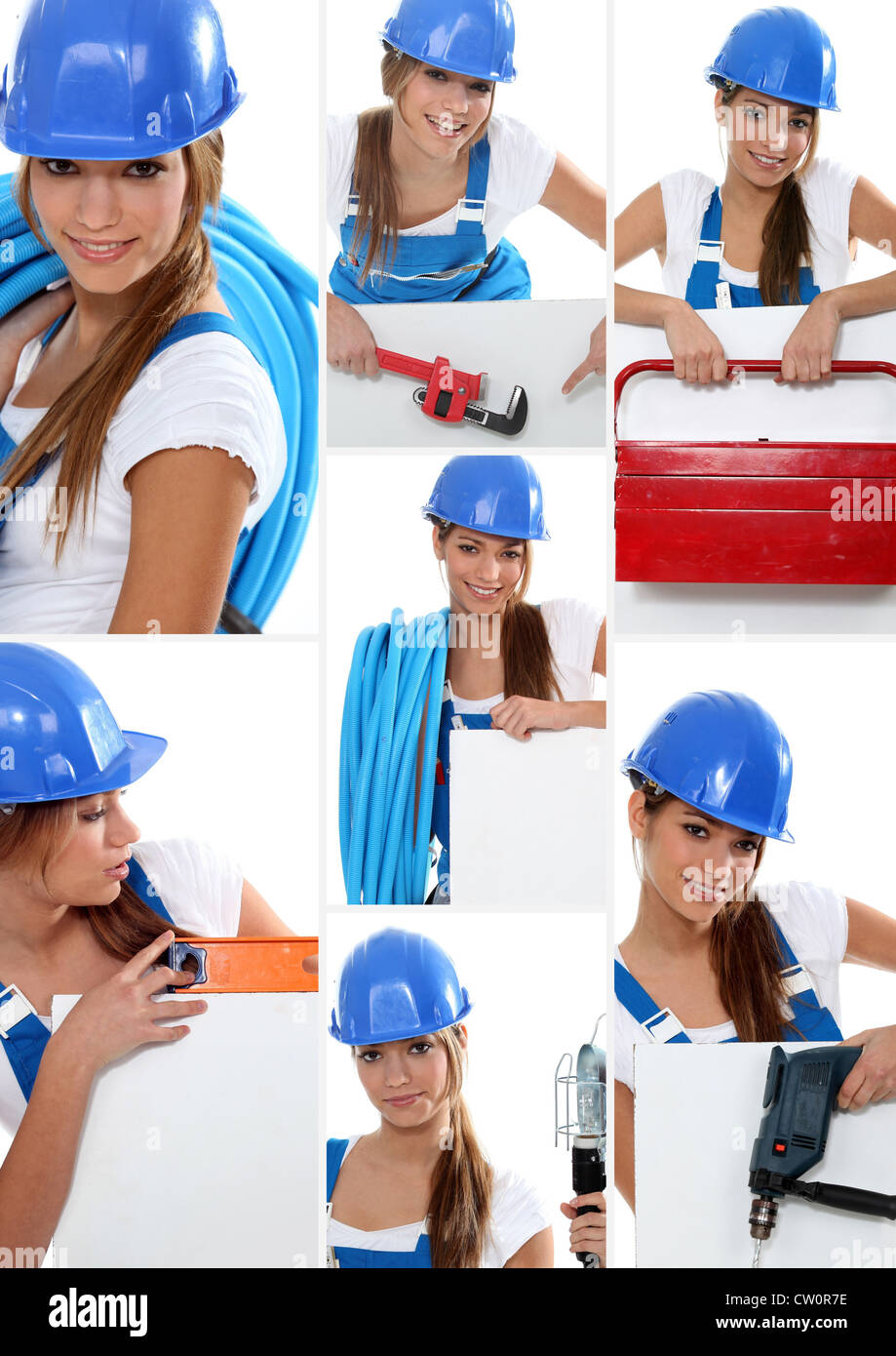 Smiling girl plumber in dungarees Stock Photo - Alamy