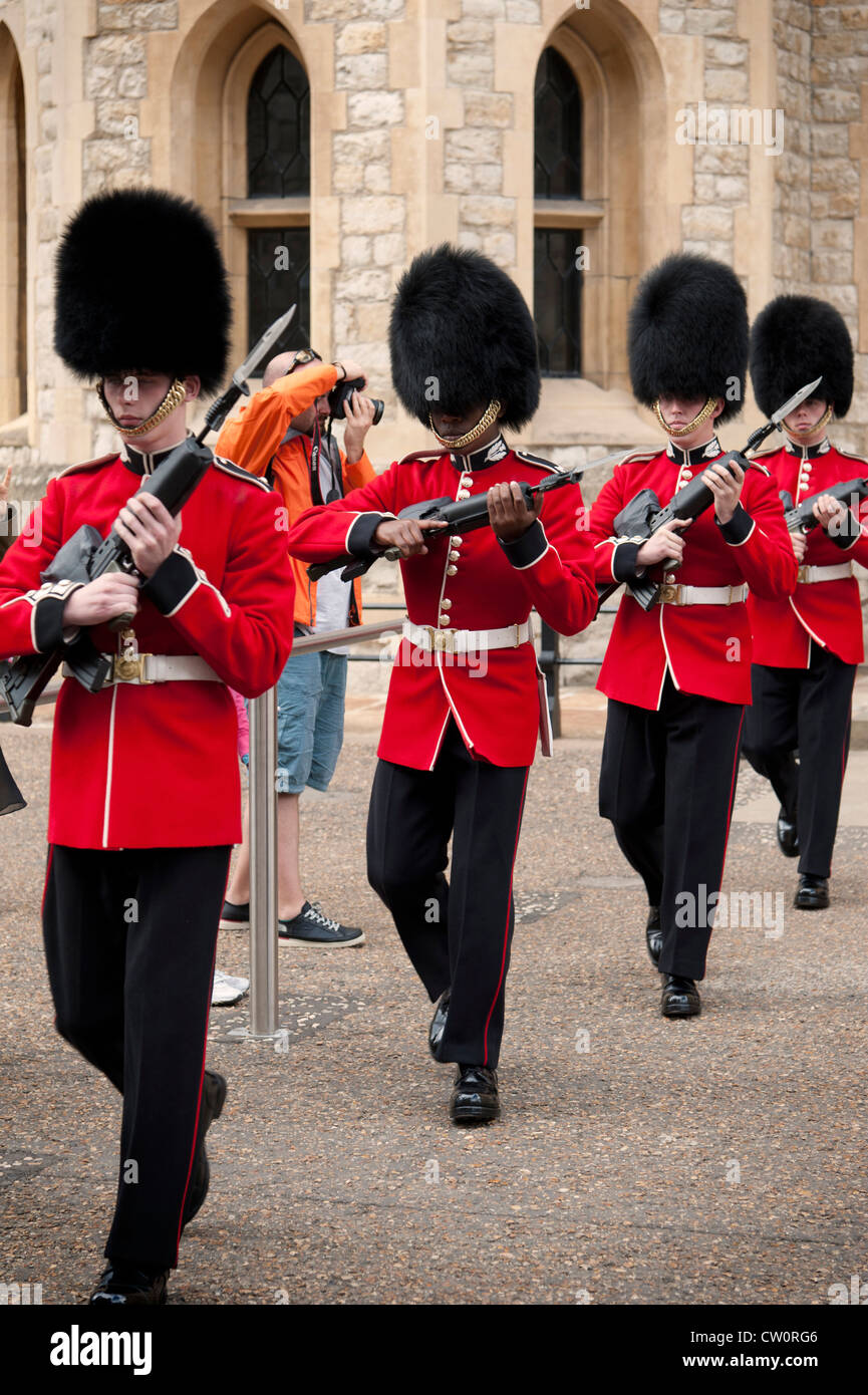 Royal Scots guards marching at the changing of the guard. Tower of ...