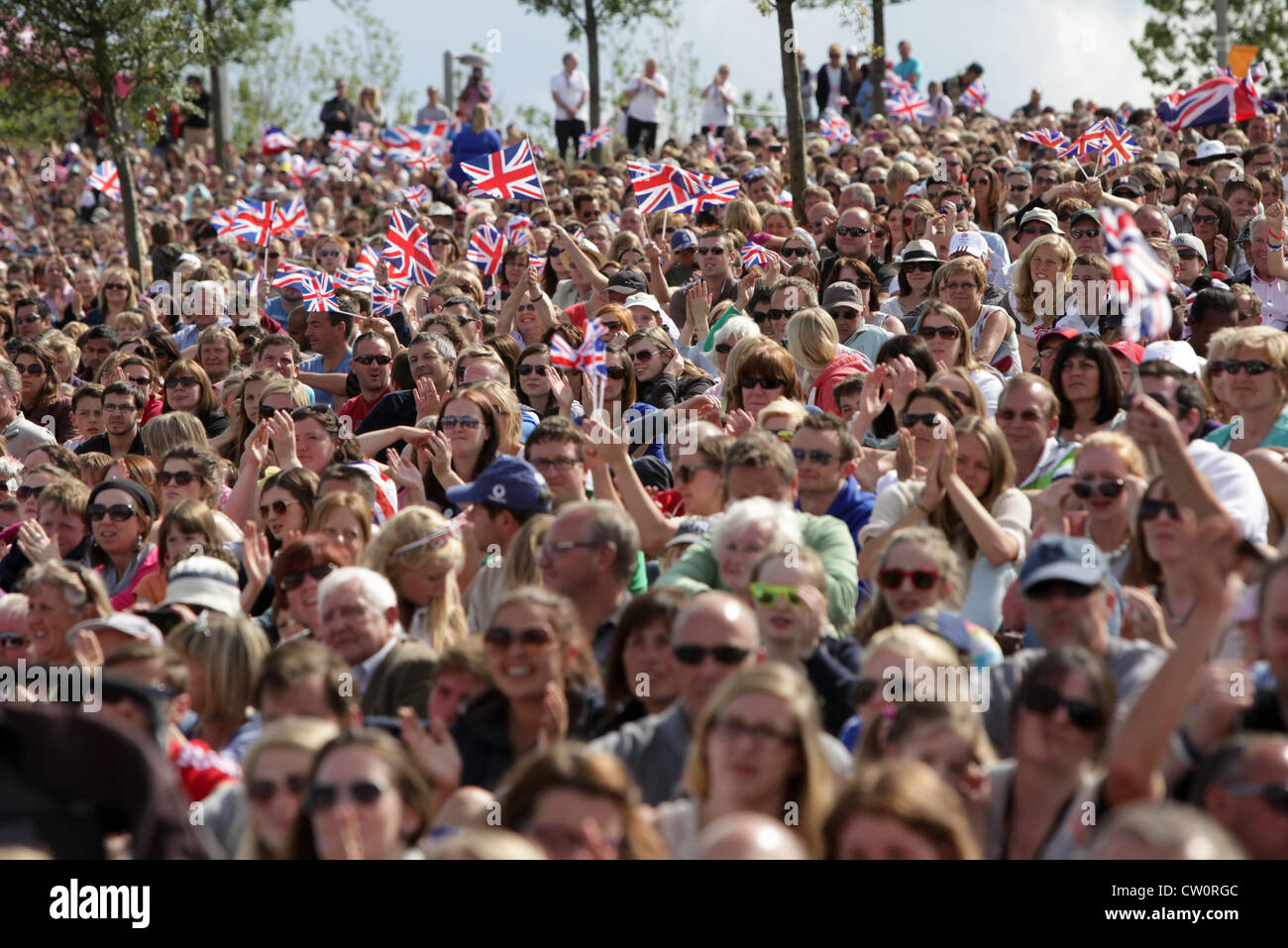 SPECTATORS WATCHING THE BIG TV SCREEN AT THE OLYMPIC GAMES LONDON 2012 ...
