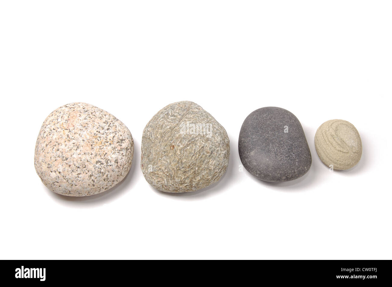 Row of assorted pebbles isolated on a white background Stock Photo - Alamy