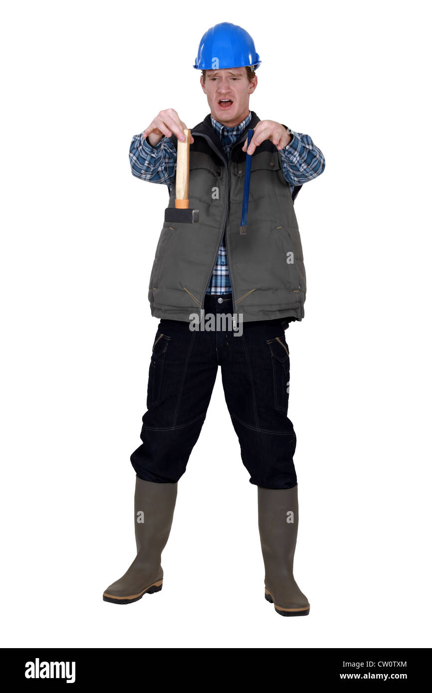 carpenter dropping hammer Stock Photo - Alamy