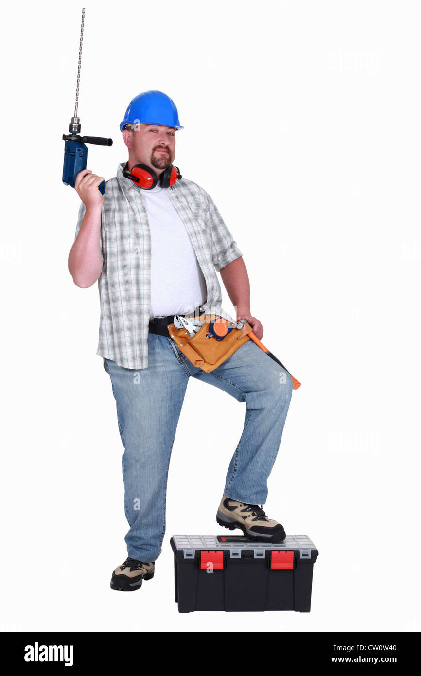 Handyman showing off all of his tools Stock Photo - Alamy