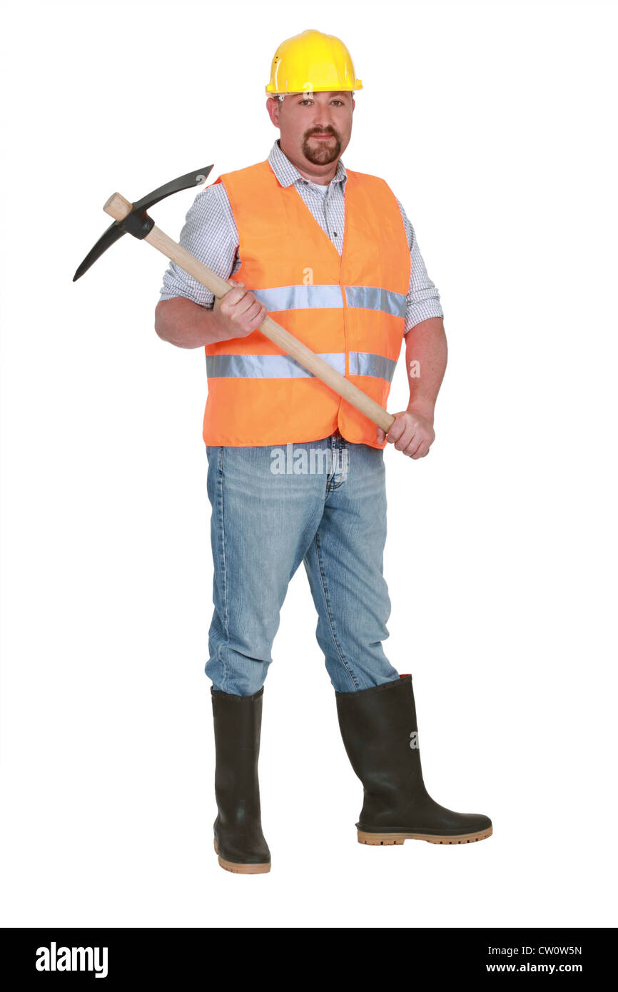 Man holding pick-Axe Stock Photo - Alamy