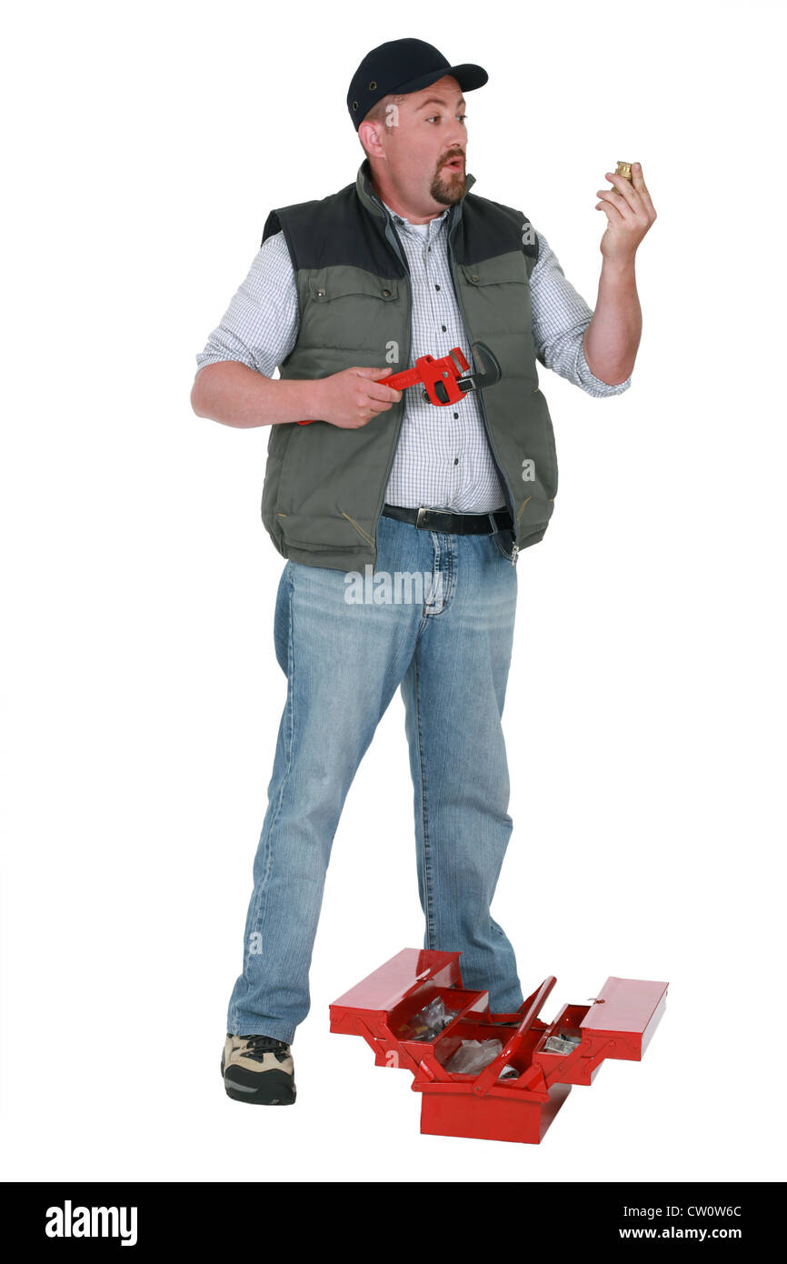 Man selecting tool Stock Photo - Alamy