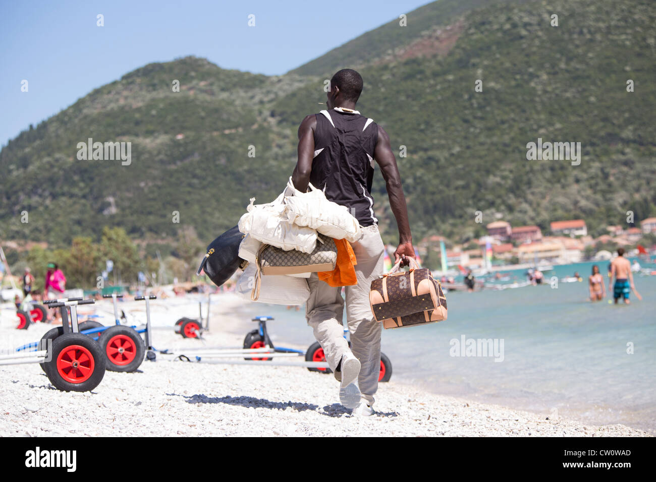 Salesman on beach hi-res stock photography and images - Alamy