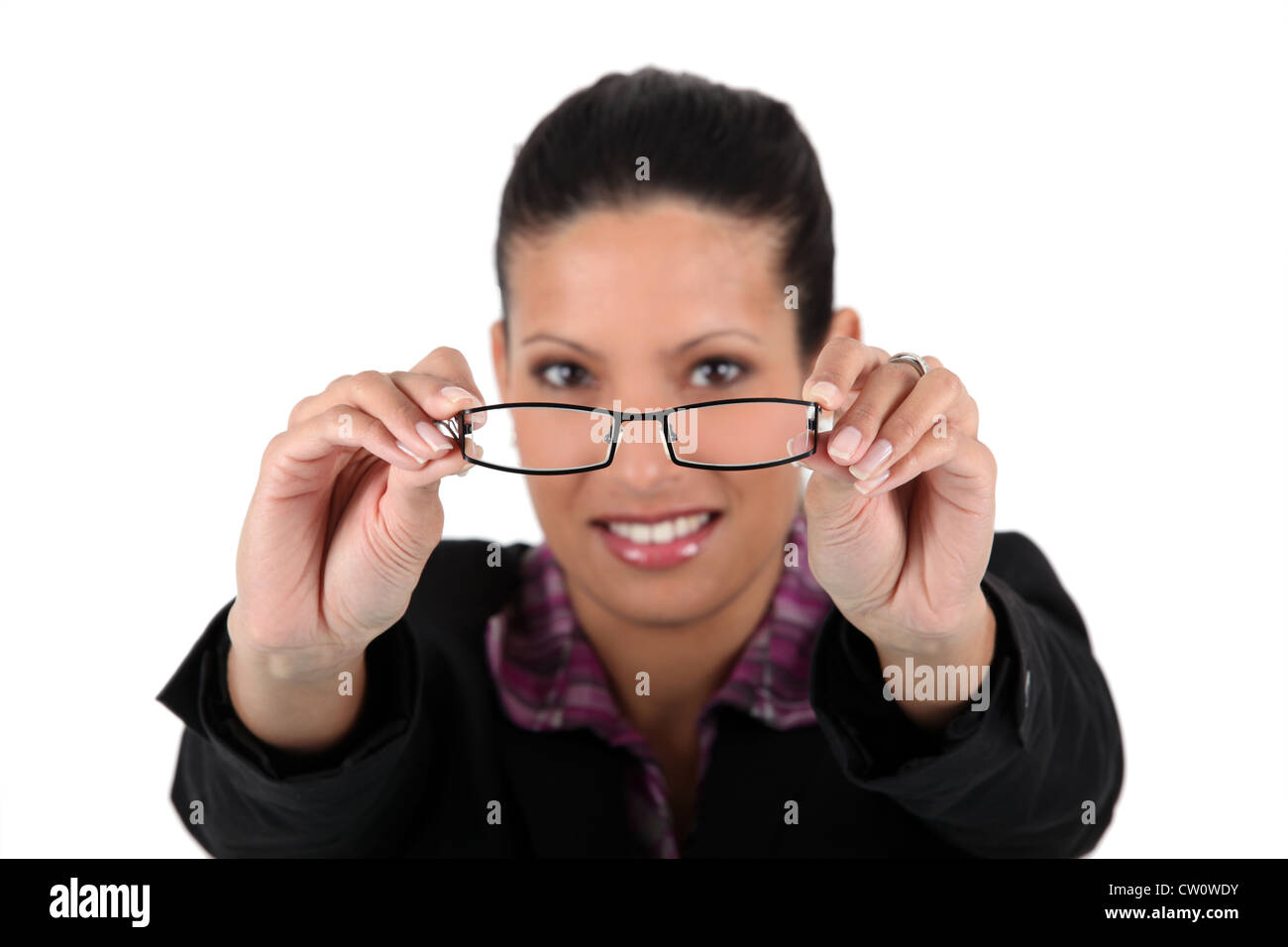 Woman holding her glasses Stock Photo - Alamy