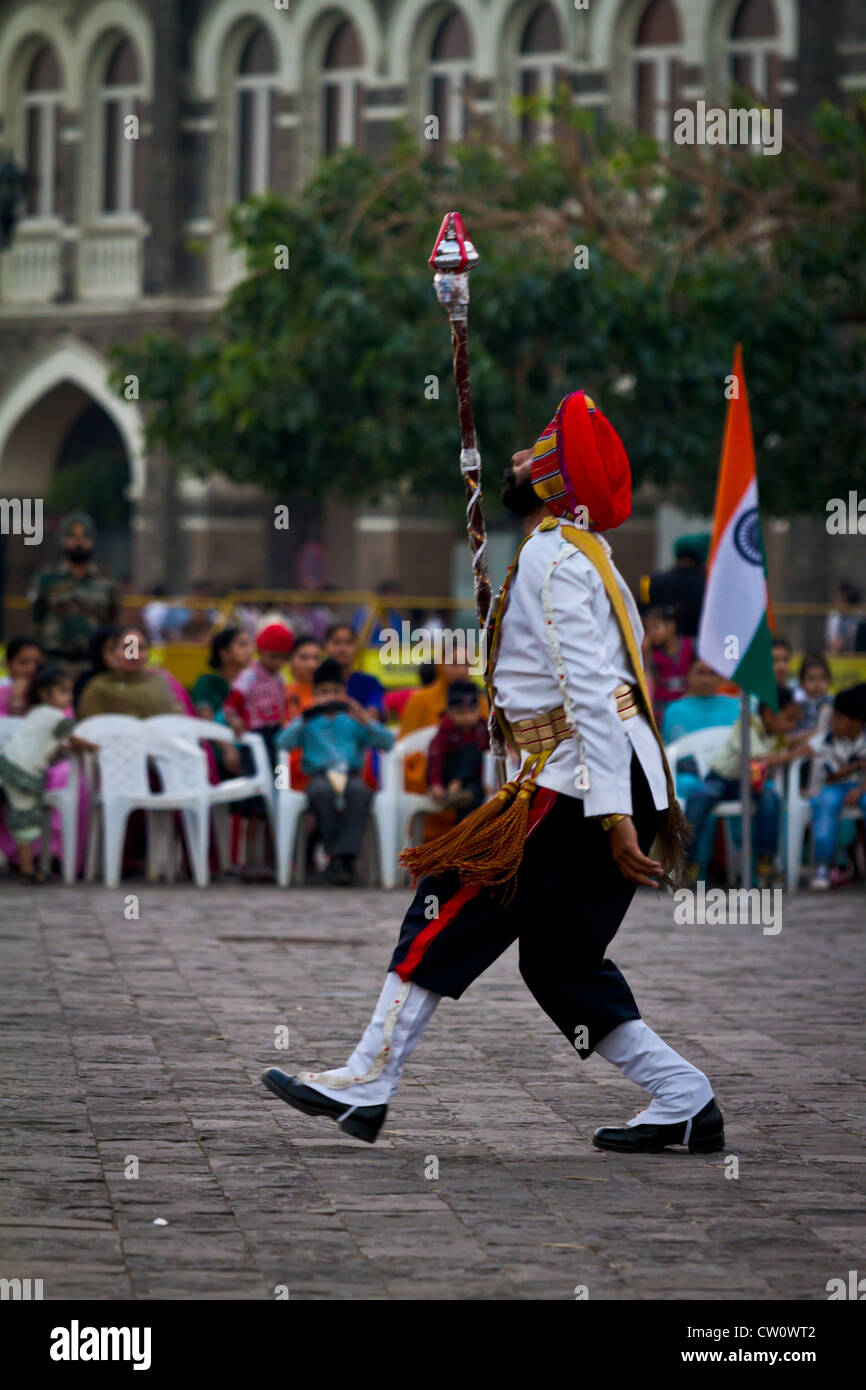 Captain of the guard on parade throws his baton outside the Gateway to ...