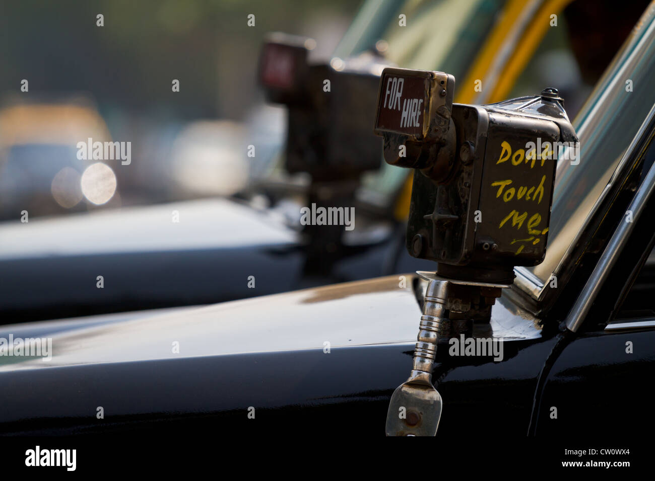 Closeup of two mechanical taxi meters in Mumbai Stock Photo - Alamy