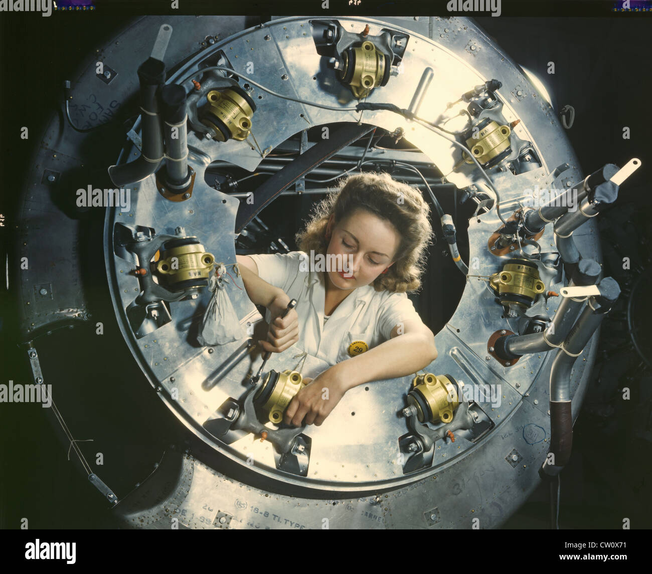 WWII Female workforce Aircraft production Woman framed by circular ...