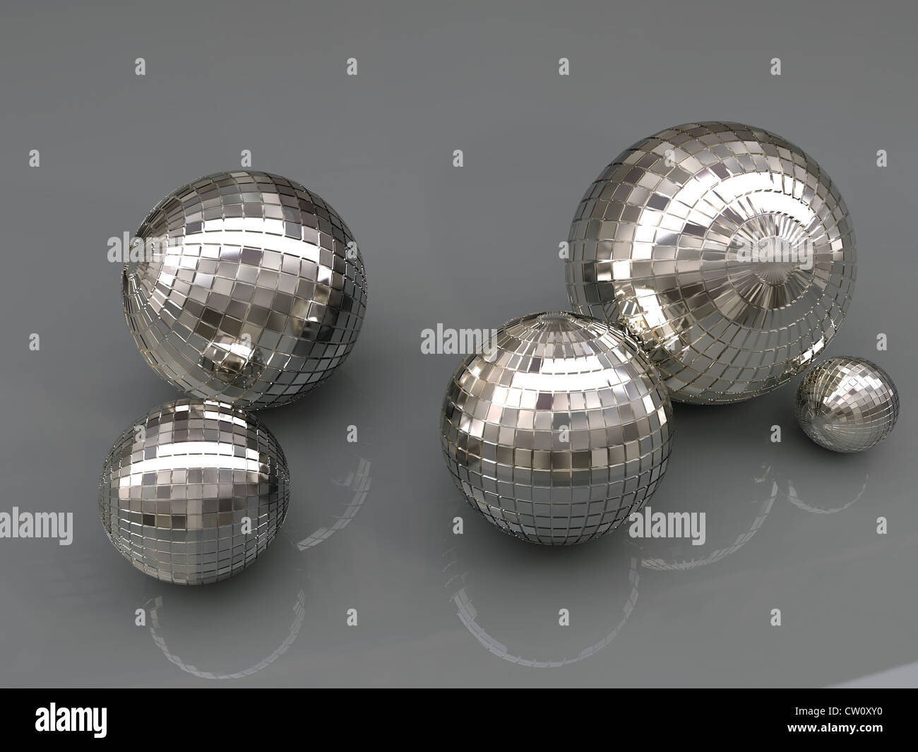 glitter balls on reflective plane Stock Photo - Alamy