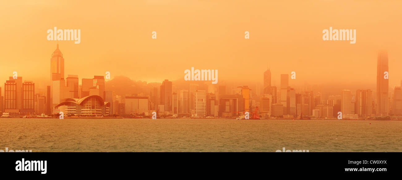Hong Kong Victoria Harbour sunrise with red color Stock Photo - Alamy
