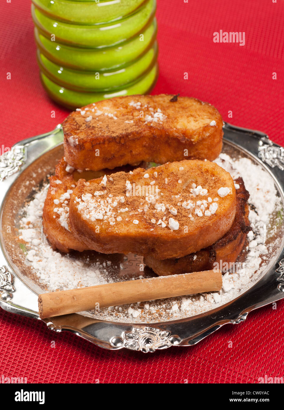 A portion of traditional Spanish torrijas, sweet fried bread slices ...