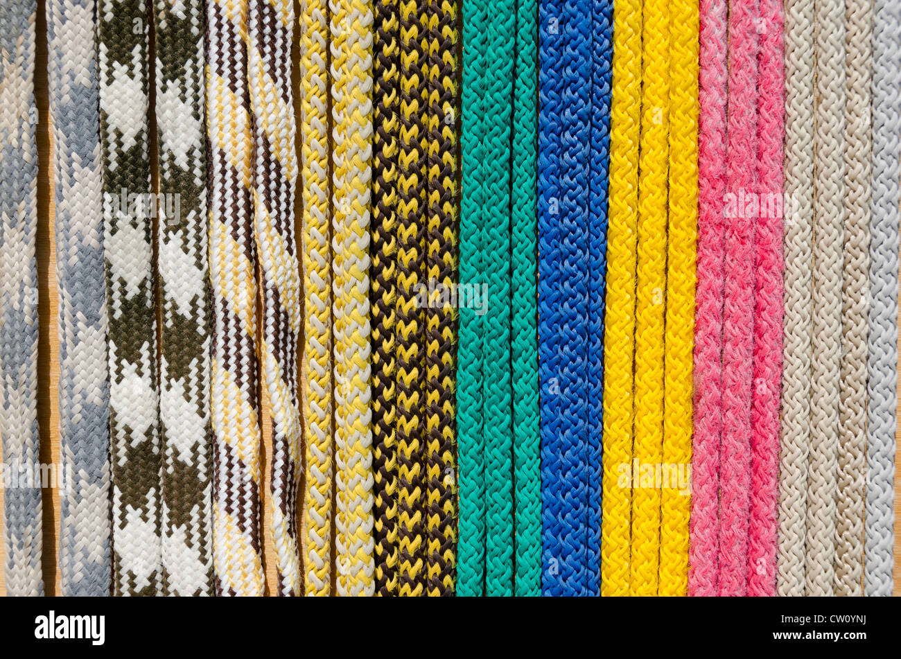 nylon strings of many colors on display Stock Photo - Alamy