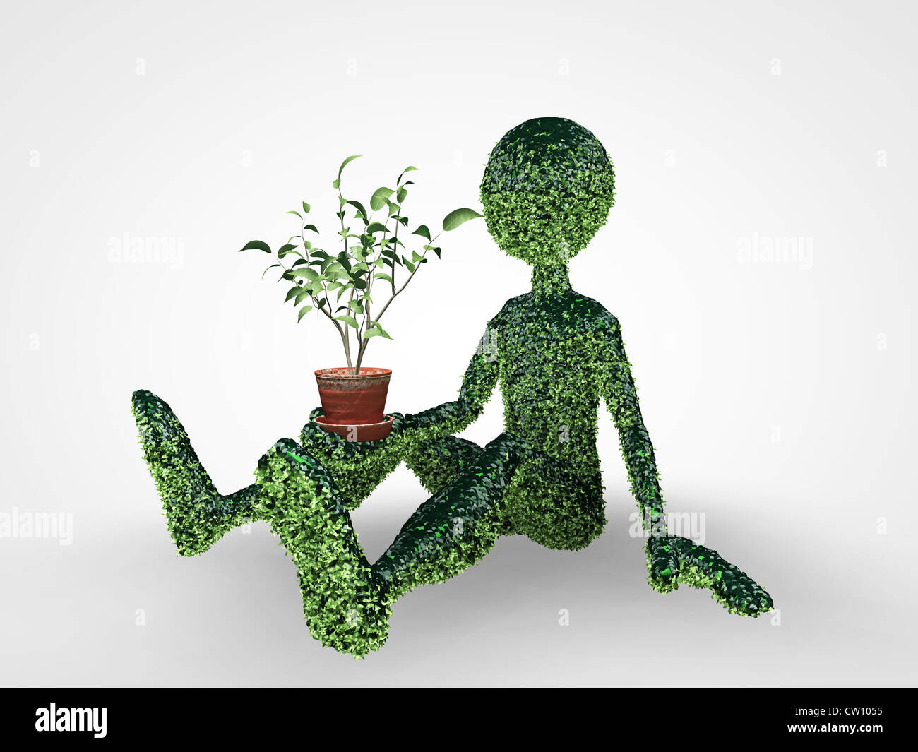 grass man with a small plant on the palm of his hand Stock Photo - Alamy