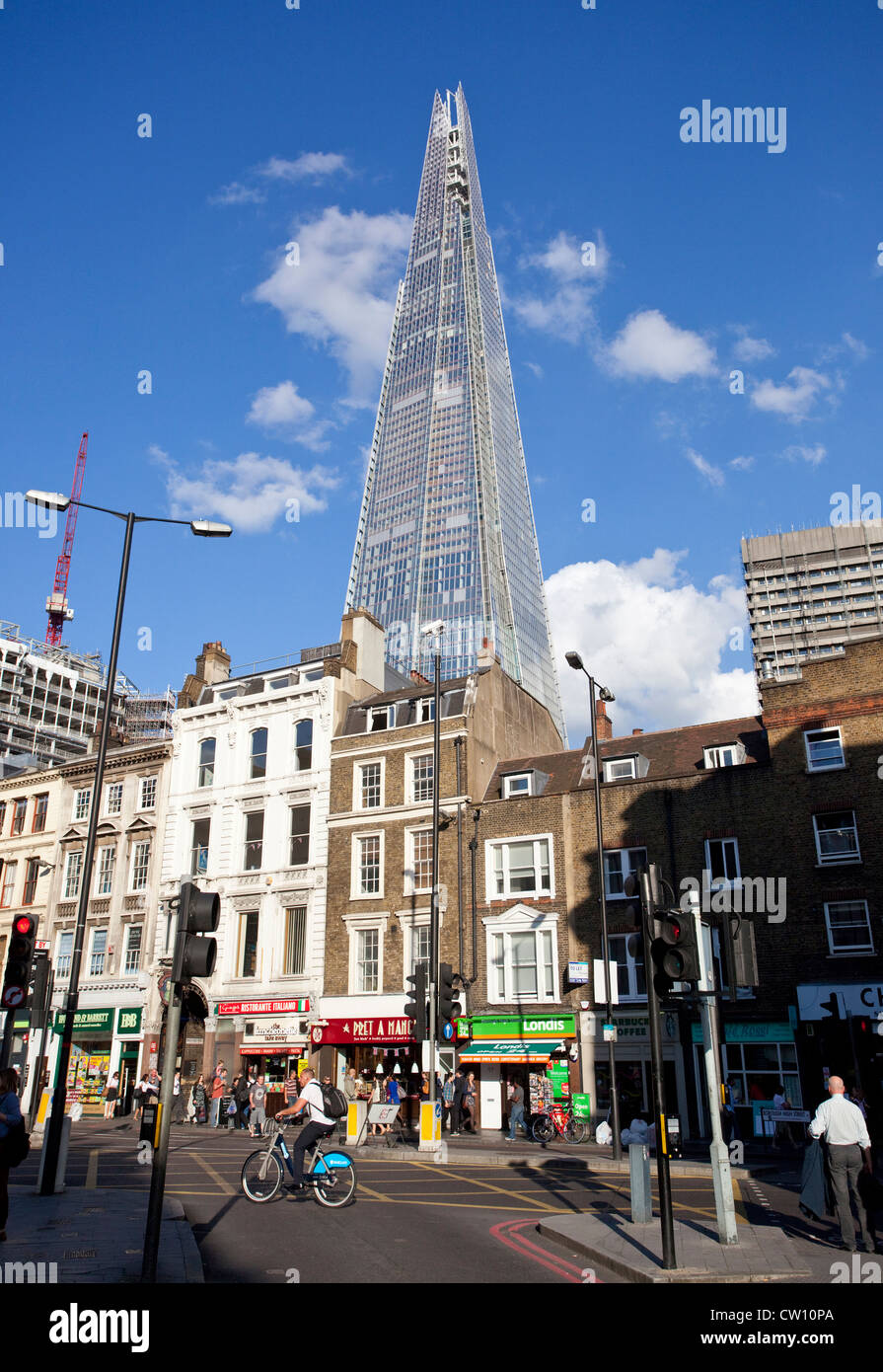 Street scene on Southwark Street with The Shard building in the ...