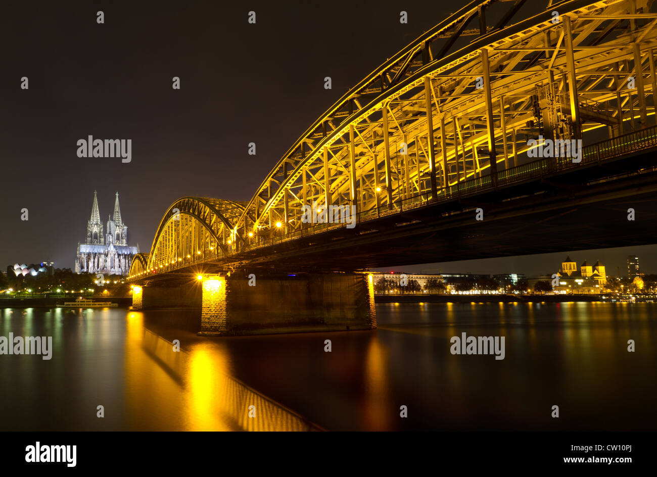Cologne Cathedral and Hohenzollern Bridge at night, Cologne, Germany ...