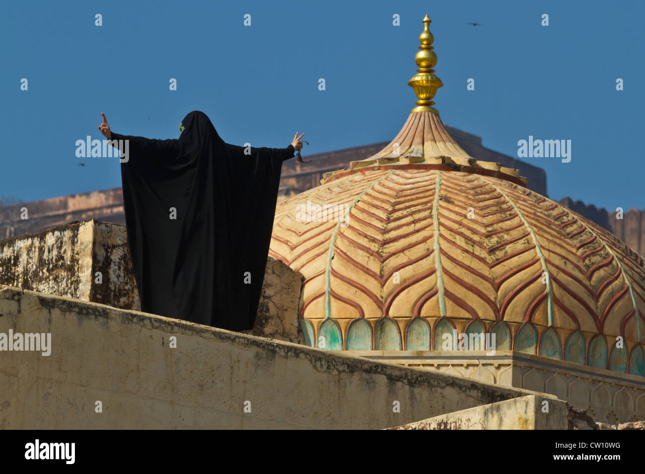 Woman in burka poses for a picture in the Amber Fort, Jaipur Stock ...