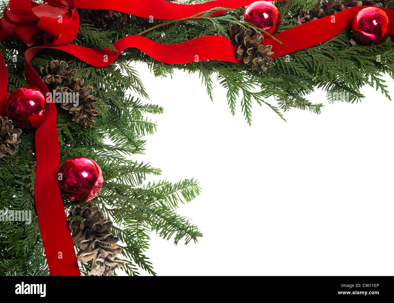 Christmas corner border with red bow and pine cones Stock Photo - Alamy