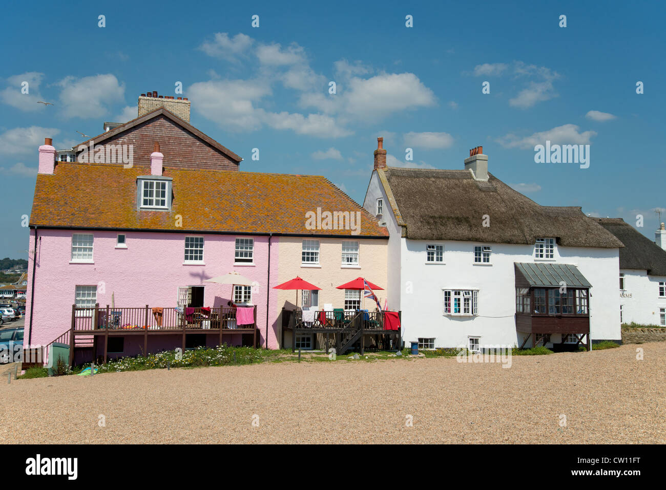 Beachfront cottages, West Bay, Dorset, England, United Kingdom Stock ...