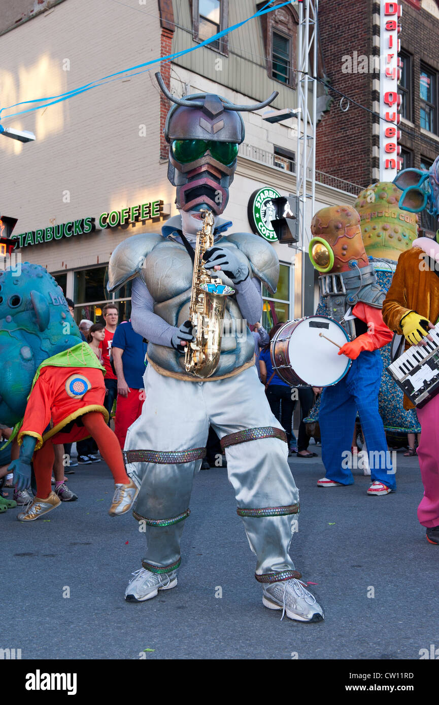 Big Nazo masked saxophonist performing on the street during the ...