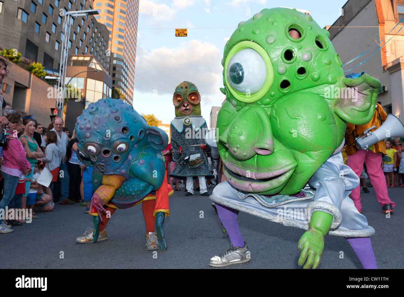 Big Nazo masked musicians and dancers performing on the street during ...