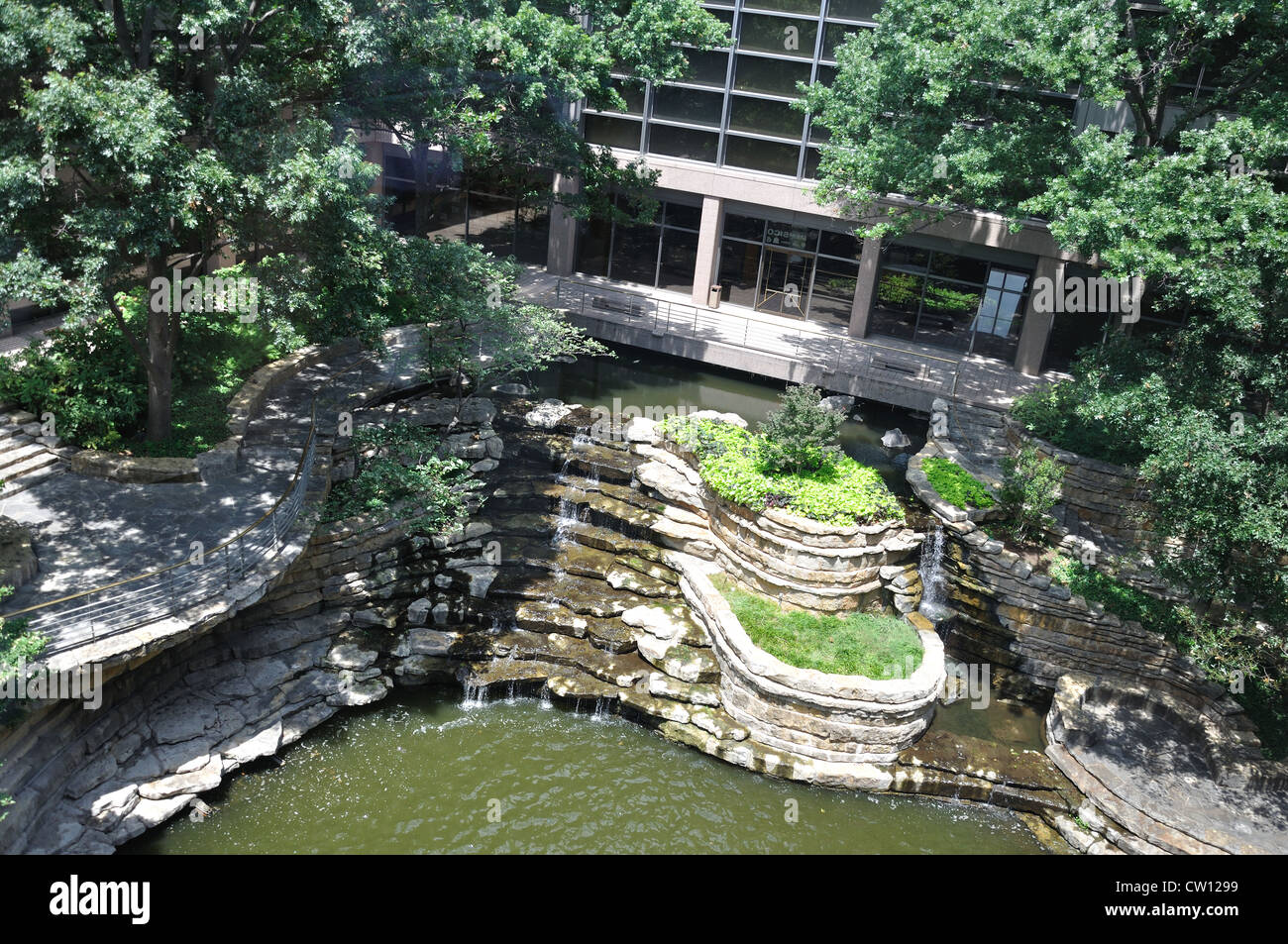 Frito-Lay headquarters office building courtyard with man-made ... Frito-Lay headquarters office building courtyard with man-made ...