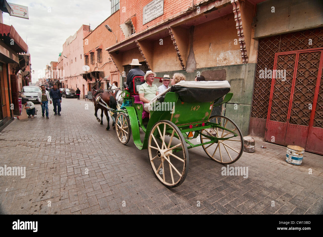horse carriage in the ancient medina of Marrakech, Morocco Stock Photo ...