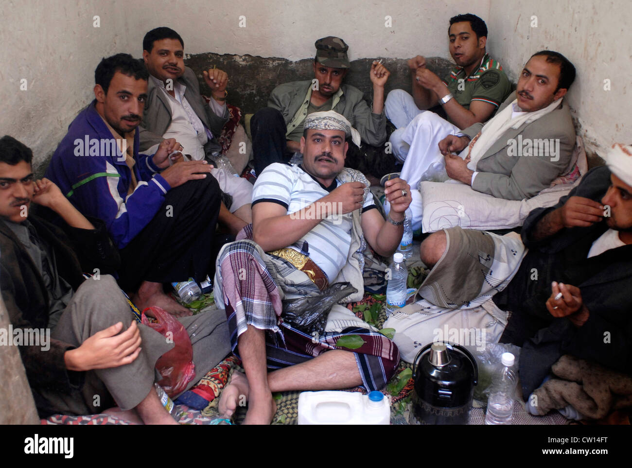 Men chewing Qat in the old city of Sana'a, a UNESCO World Heritage Site ...