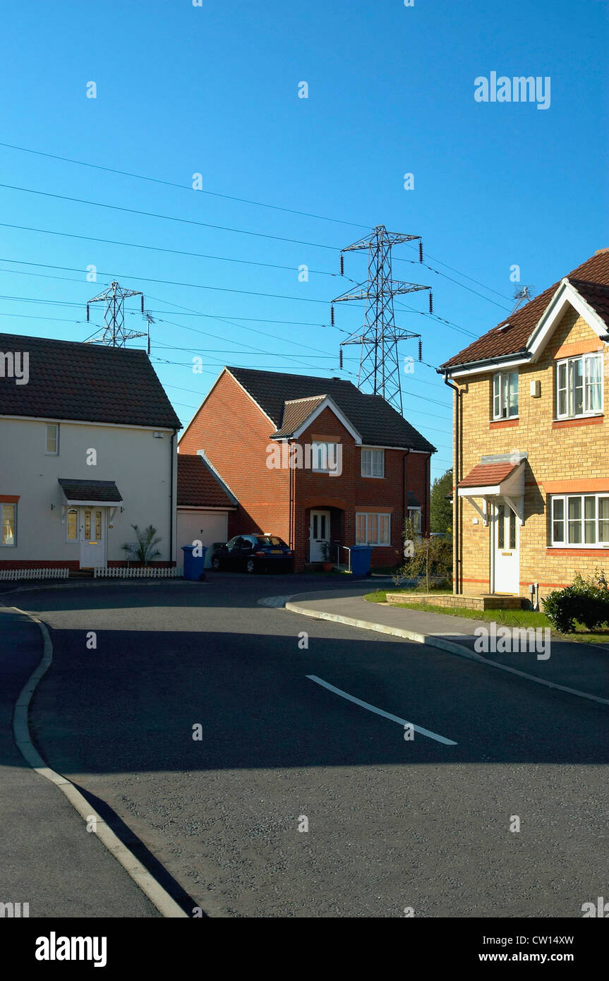 Houses with Electric pylon, England Stock Photo - Alamy