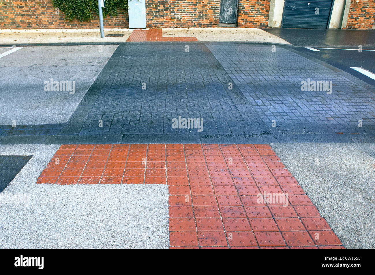 Road marking with feature for blind people at pedestrian crossing. UK ...