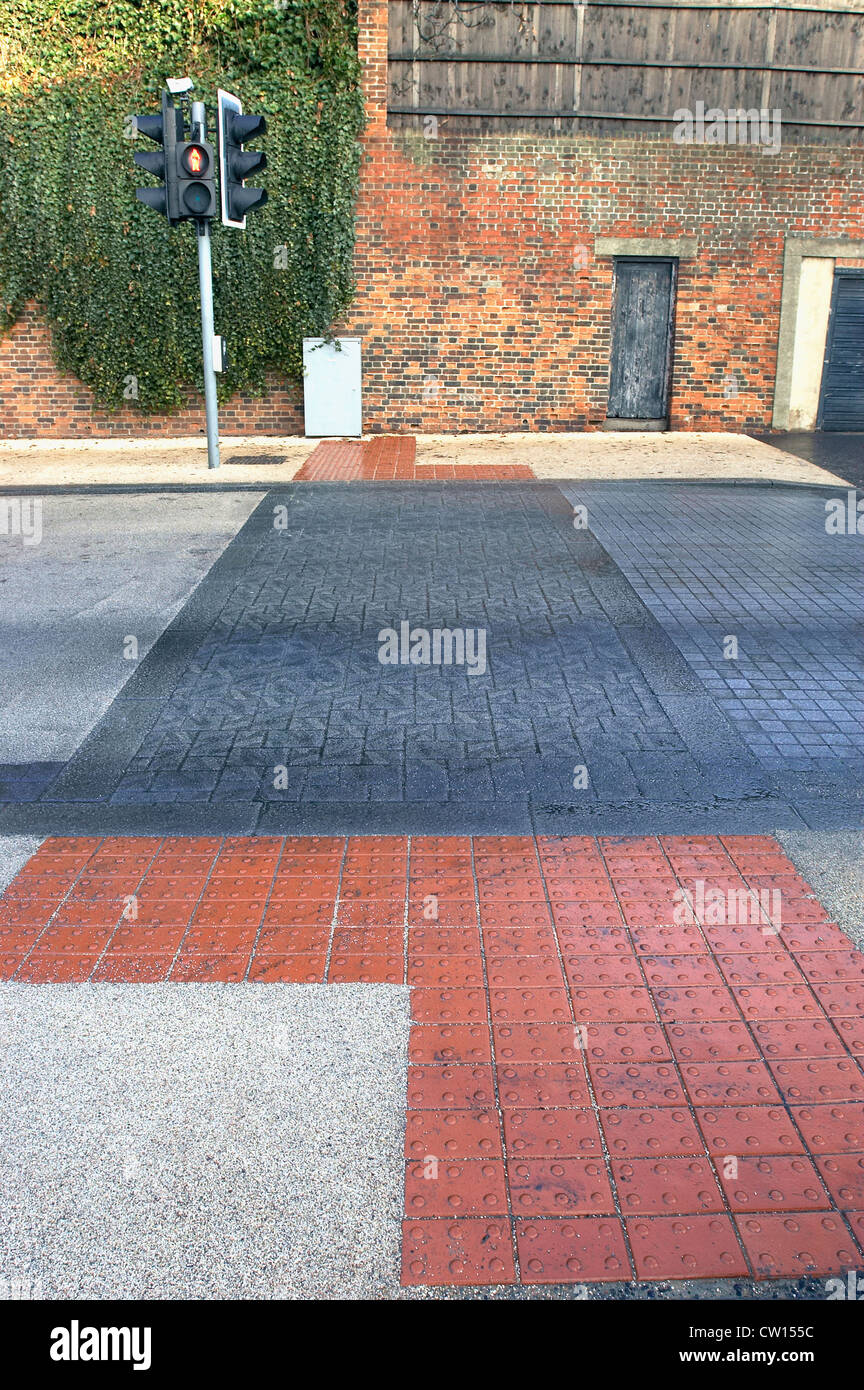 Road marking with feature for blind people at pedestrian crossing. UK ...