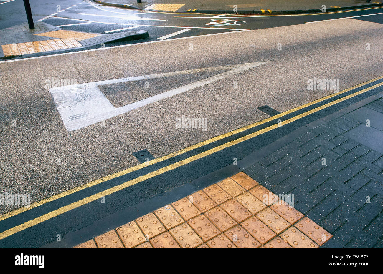 Coloured asphalt applied on road crossing with feature for blind ...