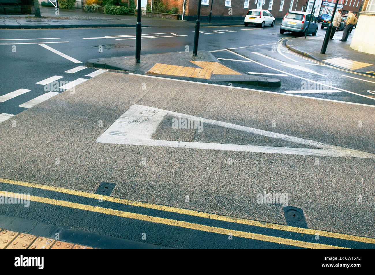 Coloured asphalt applied on road crossing with feature for blind ...