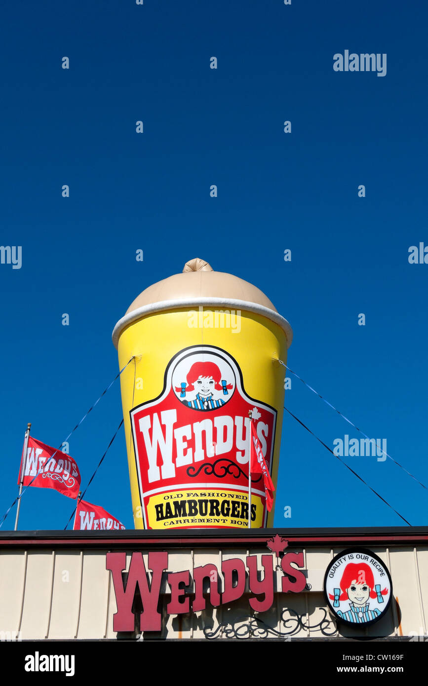 Advertising signs for Wendy's fast food hamburger milkshake restaurant ...