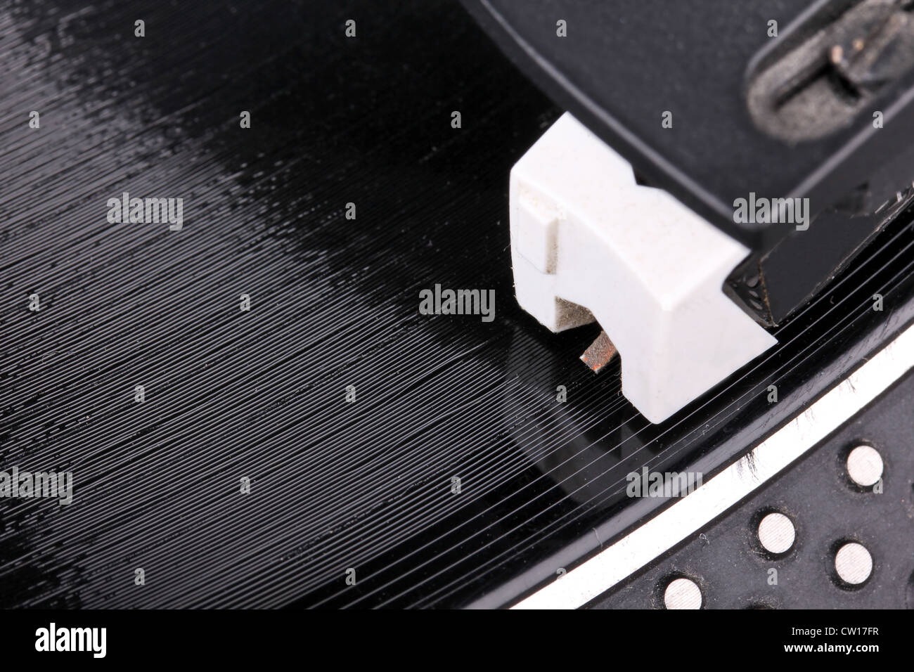 Dj needle on spinning record, closeup Stock Photo - Alamy